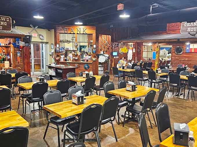 Rustic wooden walls, butcher-block tables, and a "Bank" sign that pays out in biscuits and gravy.