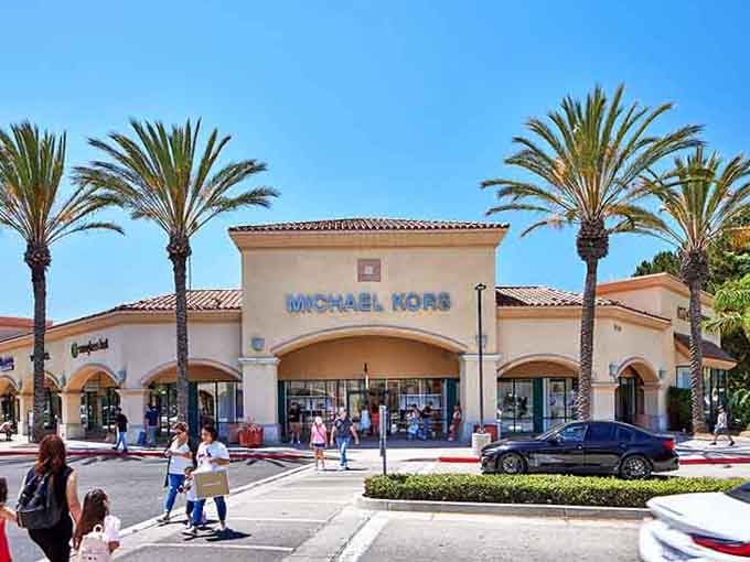 Palm trees, blue skies, and a Michael Kors sign. Honestly, California really does show off sometimes.