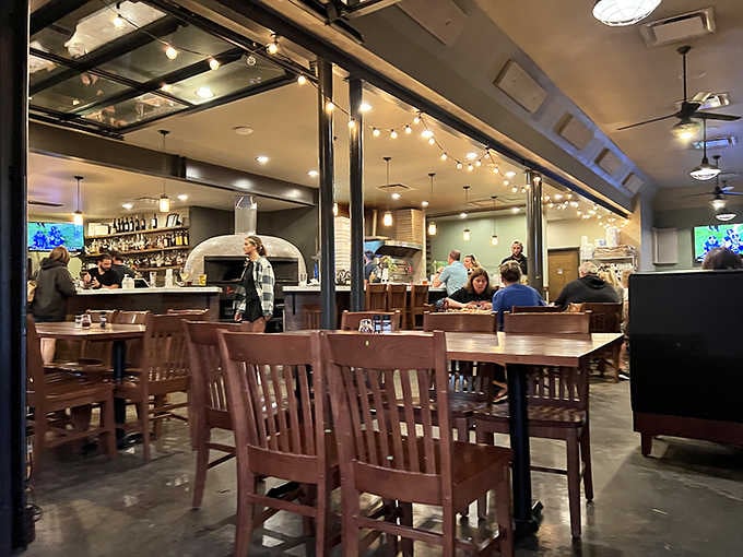 String lights and warm wood create an atmosphere that's both date-night worthy and comfortable enough for sweatpants.