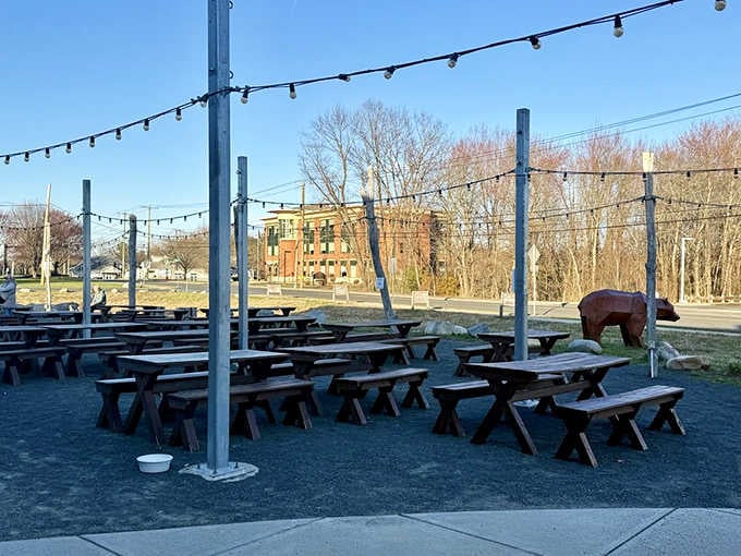 Picnic tables under string lights create the perfect setting for pretending you're seaside, even landlocked.