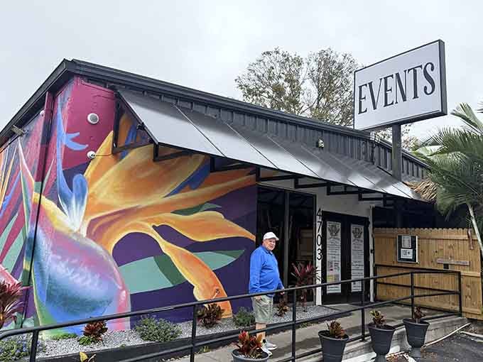 That bold bird-of-paradise mural outside tells you immediately that something wonderful is happening inside.