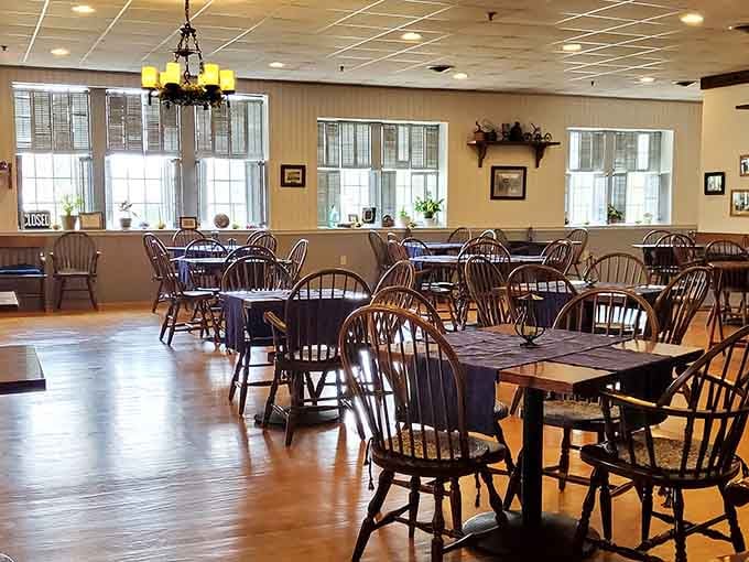 Warm wood tones and Windsor chairs create the kind of dining room where celebrations feel natural and comfort is guaranteed.