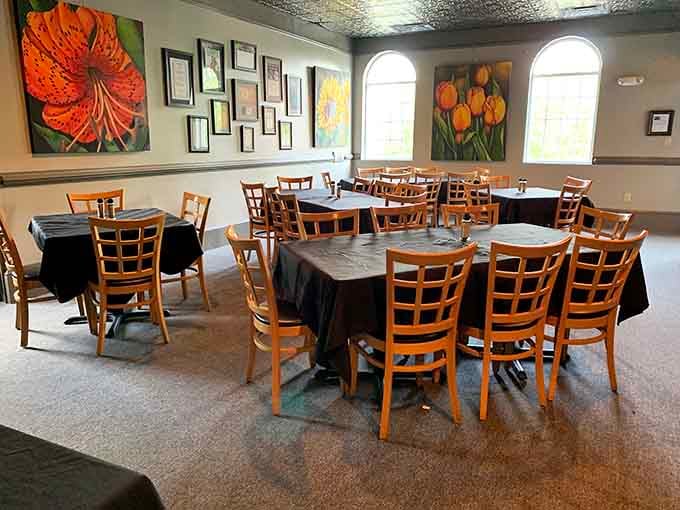 Bright florals and polished floors create an atmosphere where comfort meets sophistication without any stuffiness whatsoever.