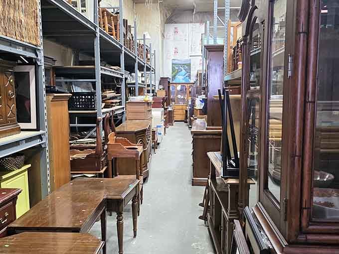 Aisle after aisle of solid wood furniture, each piece quietly waiting for someone smart enough to claim it.