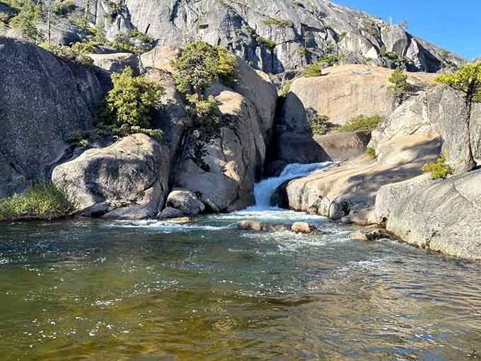 That waterfall isn't Niagara, but it's perfectly sized for swimming under without getting completely pummeled by Mother Nature.