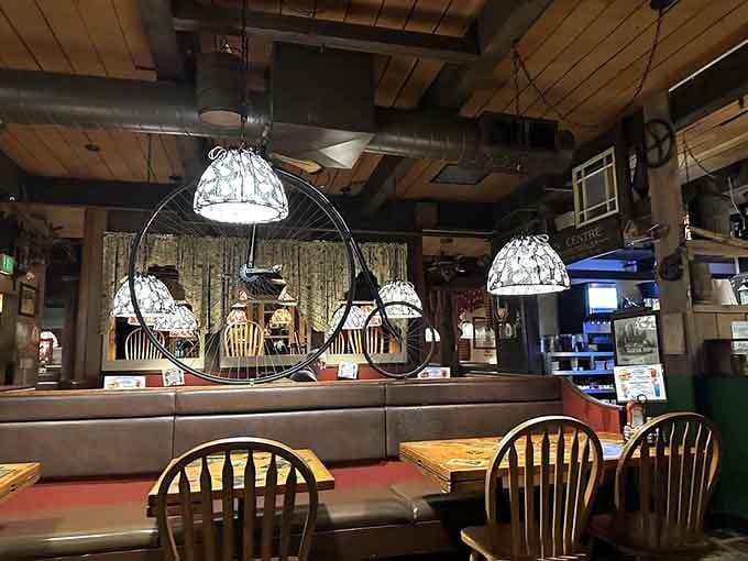 Penny-farthing bicycle wheels as light fixtures, because why settle for ordinary when extraordinary is right there?