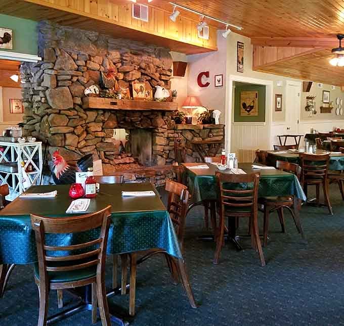 That stone fireplace isn't decorating the room. It IS the room, warm and welcoming as a bear hug.