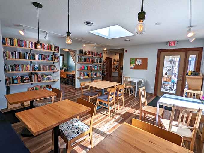 Warm wood, glowing bulbs, and shelves full of stories. This room practically pulls up a chair for you.