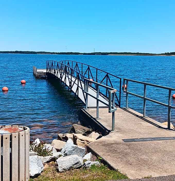Your boat ride to paradise starts here, where that blue gangway leads straight to island adventures.