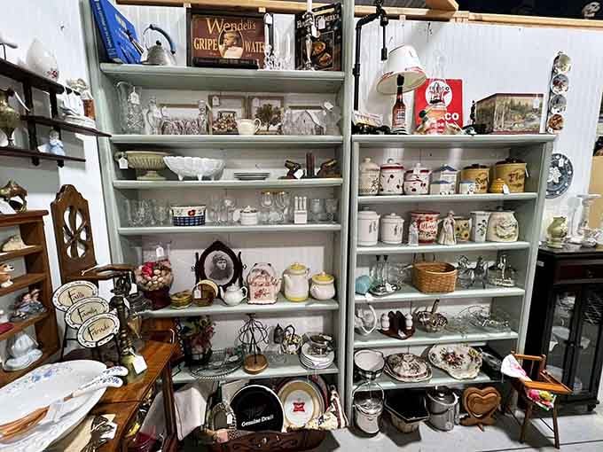 Shelves packed with ceramic canisters, glassware, and teapots that would make any home cook swoon.