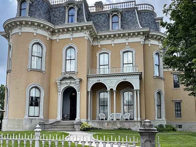 Three stories of French Second Empire glory, and yes, that mansard roof is every bit as dramatic as it looks.