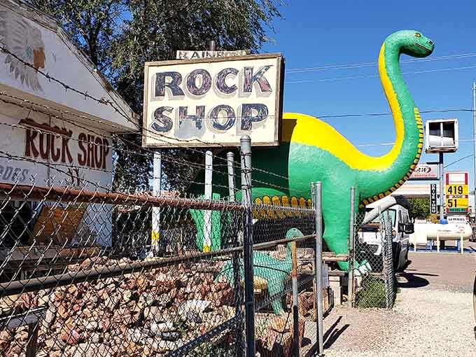 The Rainbow Rock Shop sign has welcomed curious travelers for decades, dinosaurs included.