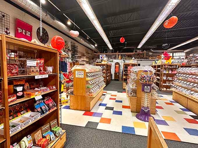Wooden shelves, a checkerboard floor, and enough candy to make your dentist quietly weep with professional concern.