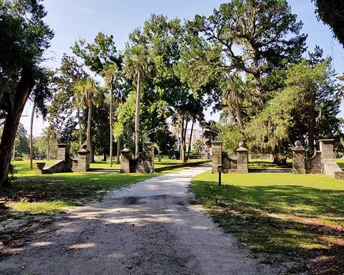 Those ornate iron gates framed by Spanish moss-draped oaks make one heck of a first impression.