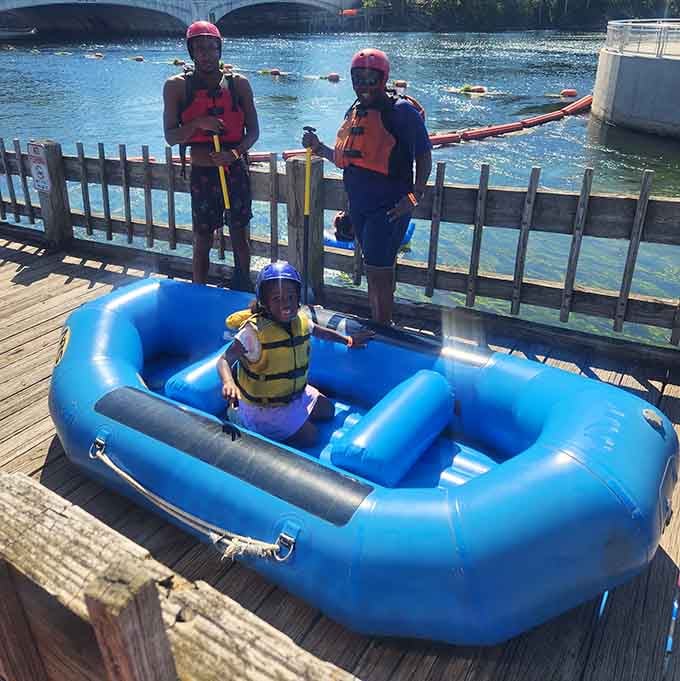 That smile says it all. Even the smallest rafter knows this blue inflatable raft means serious business today.