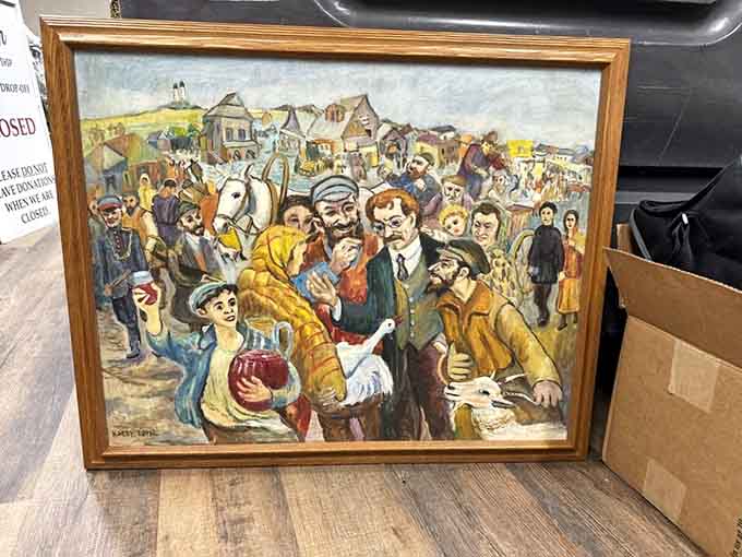 This framed oil painting tells a whole village story. Someone's loss is absolutely your living room's gain.