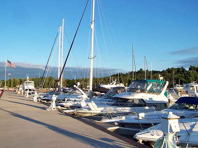 Sailboats lined up like they're waiting for the best sunset of their lives, and honestly, they're not wrong.