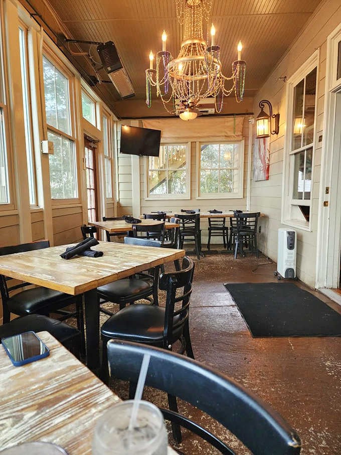 Inside, chandeliers meet casual comfort where rustic tables set the stage for your upcoming Cajun adventure.
