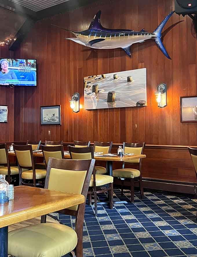 Cozy wooden walls, anchor carpets, and a massive marlin create the perfect maritime dining atmosphere for your next casual dinner.