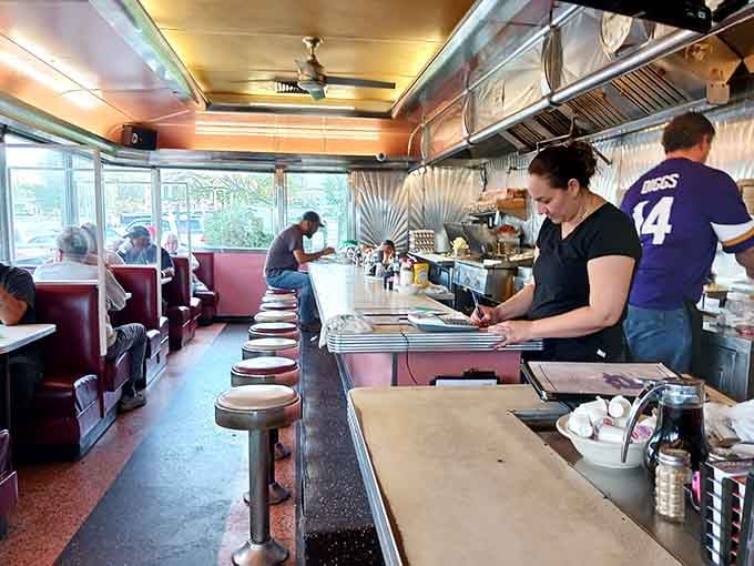 A counter, some stools, and people who actually know your order. Pure diner magic happening right here.