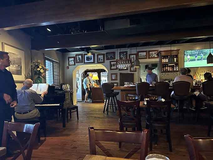 Live piano, warm lighting, and framed photographs on the walls. This room means serious business about a good time.