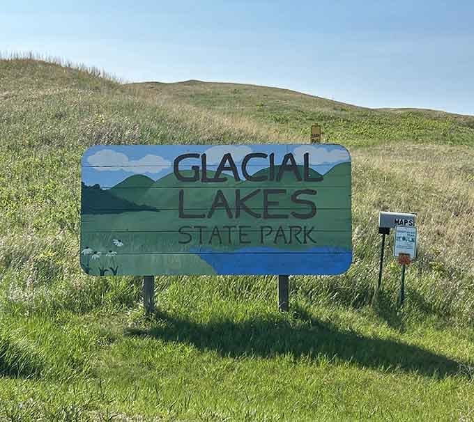 Welcome to your next adventure, where the sign promises beauty and the landscape absolutely delivers on it.