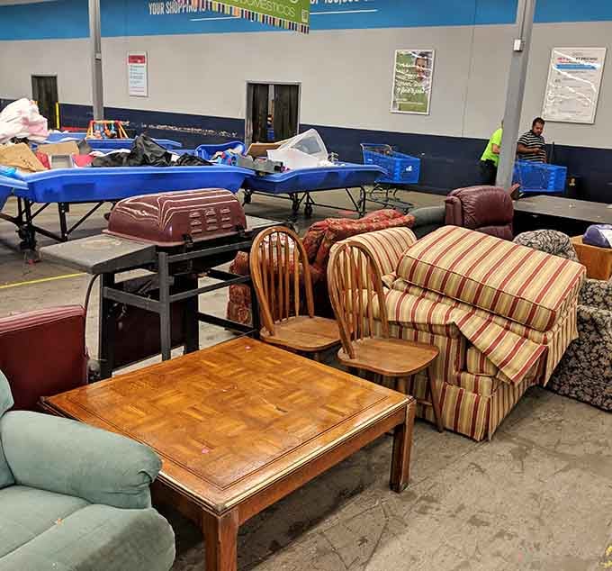 Sofas, armchairs, and coffee tables crowd the floor like old friends at a reunion, all priced to move.