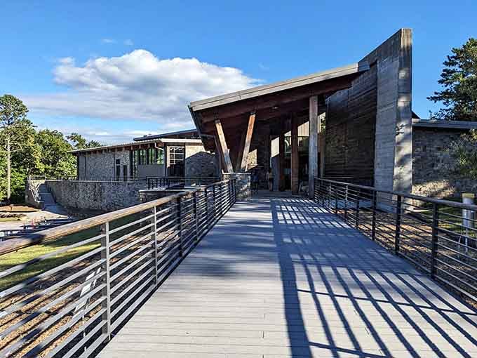 The visitor center says "welcome to the wilderness" with style, stone, and serious architectural swagger.