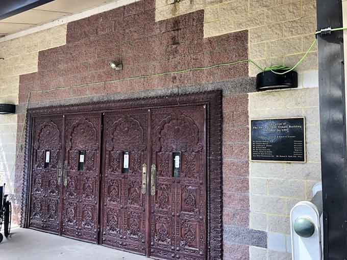 These magnificent carved wooden doors don't just open a building, they open an entirely different world.
