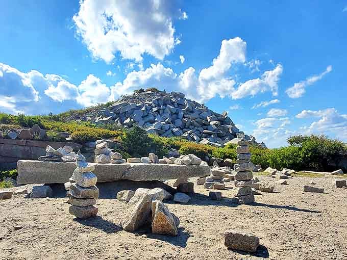 Visitors have been stacking these granite pieces for years, creating a quirky sculpture garden by the sea.