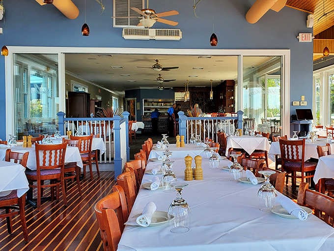 White tablecloths, warm wood chairs, and harbor breezes drifting through open walls. This is Connecticut doing its finest work.