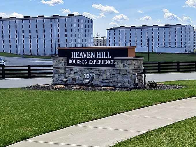 The sign says it all. Behind those rick houses, thousands of barrels are patiently doing something wonderful.