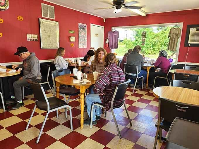 Red walls, checkered floors, and happy people. Hinkle's dining room is proof that great atmosphere costs nothing extra.