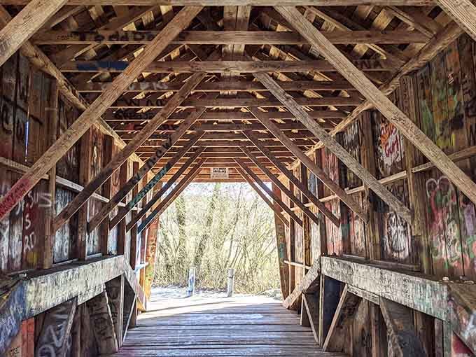 Step inside and suddenly you're in a tunnel of history, graffiti, and genuinely excellent roof geometry.