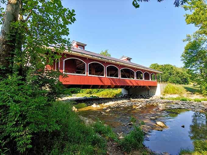 That red covered bridge isn't just pretty &mdash; it's the kind of sight that stops conversations cold.