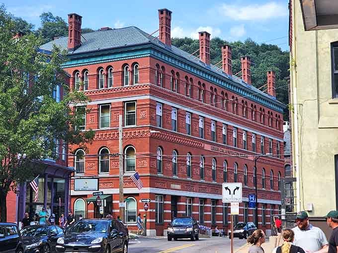 That magnificent red brick building isn't showing off, it's just being itself, and honestly, good for it.