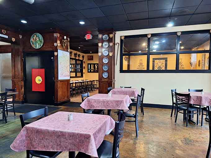 Pink tablecloths, decorative plates, and old-world charm, this dining room means serious business.
