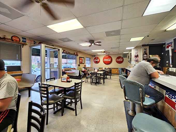 Vintage Coca-Cola signs, ceiling fans, and counter stools that have held generations of happy, well-fed Missourians.