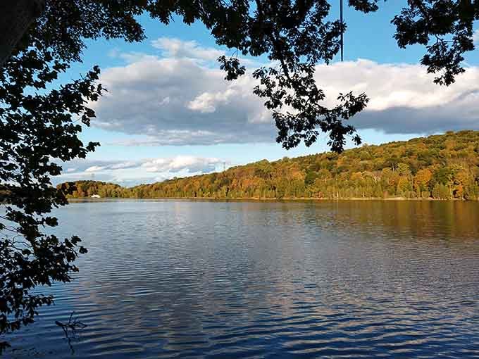 Aeroflex Lake in full autumn glory, wearing its fall colors like it just won a beauty contest nobody told you about.