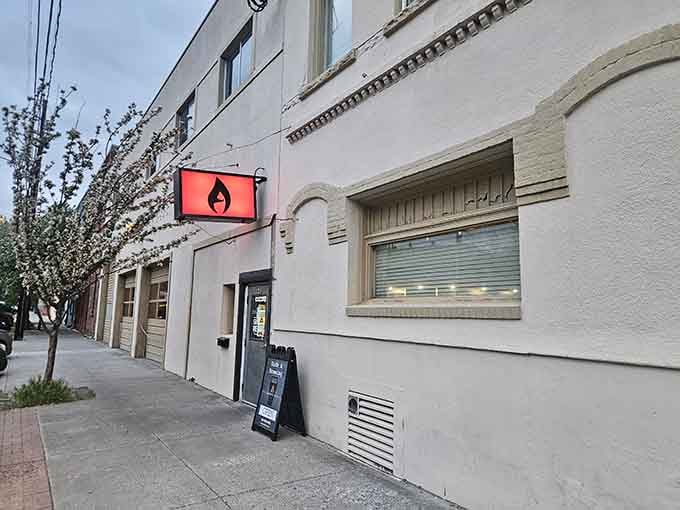 Side A Brewing's glowing flame sign is the universal signal for "good things happen inside."