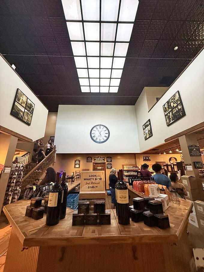 That large wooden tasting bar isn't going to visit itself, and neither are those rows of bottles waiting patiently for you.