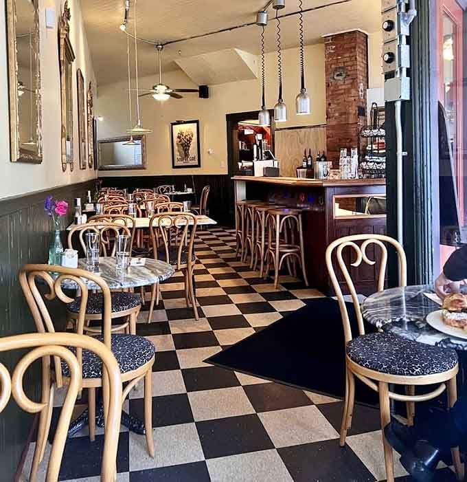 Black and white checkered floors and bentwood chairs transport you straight to a Parisian bistro without the jet lag.