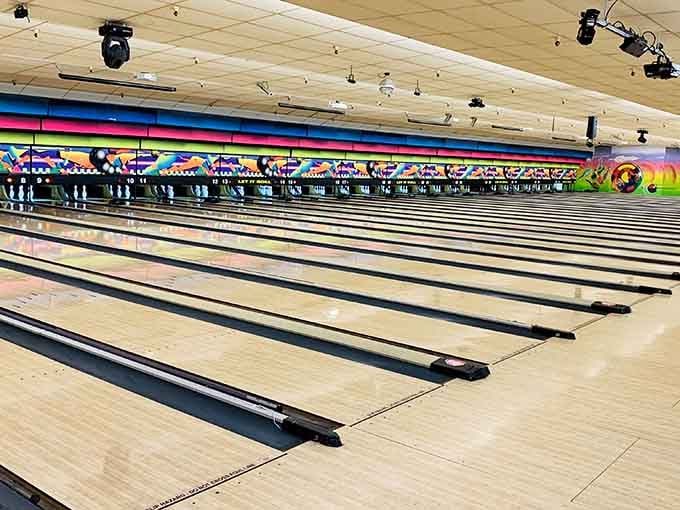 Rows of pristine lanes stretch out like wooden highways to happiness and occasional gutter balls.
