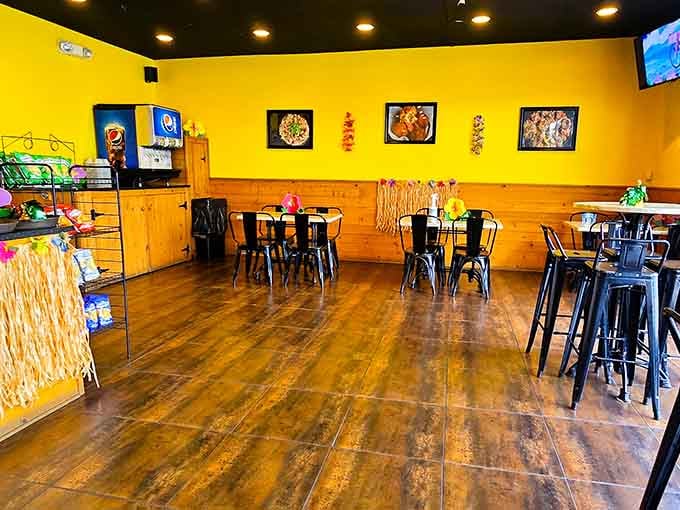 Sunny yellow walls and casual seating create the perfect backdrop for serious cheese consumption and zero judgment.