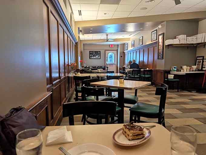Dark wood wainscoting, simple tables, and a slice of tiramisu waiting patiently, Mama Santa's dining room means serious business.