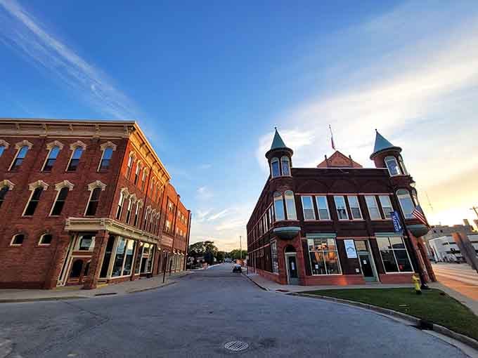 Golden hour turns Marinette's historic corner buildings into something straight out of a Hallmark movie, minus the predictable plot twist.