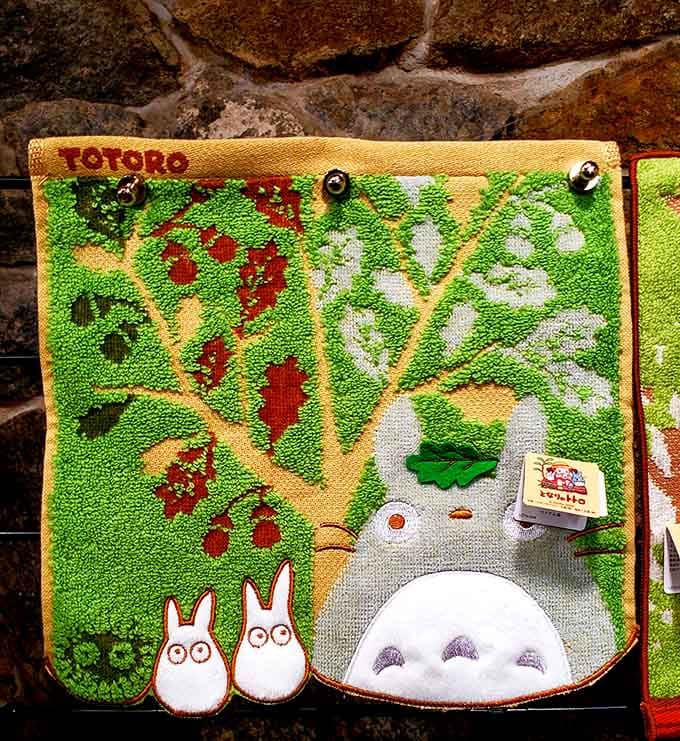 Totoro watching over you from a hand towel, because even forest spirits deserve wall space.