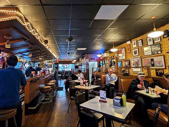 Warm string lights, leather booths, and walls packed with memories, this is what a neighborhood bar looks like when it earns its reputation.