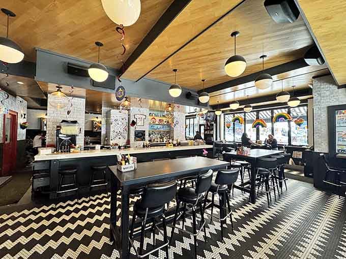 That chevron tile floor and warm wood ceiling say one thing clearly: you're going to feel right at home here.