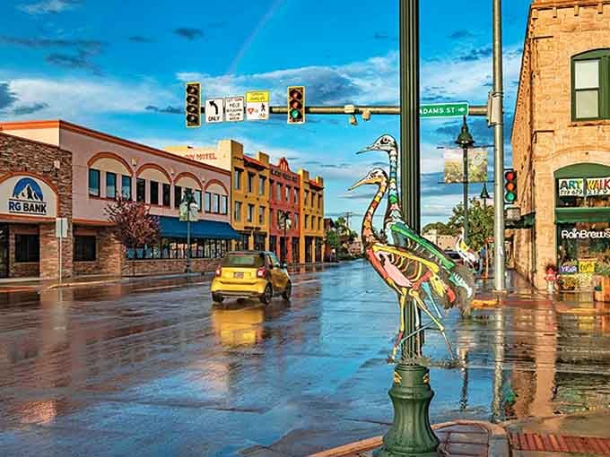 After the rain, Monte Vista's downtown gleams like a freshly washed postcard, complete with a metal crane sculpture stealing the whole show.